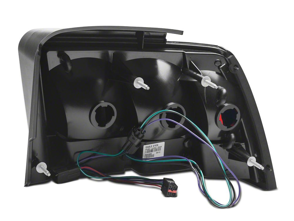 Raxiom Icon LED Tail Lights; Black Housing; Smoked Lens (99-04 Mustang