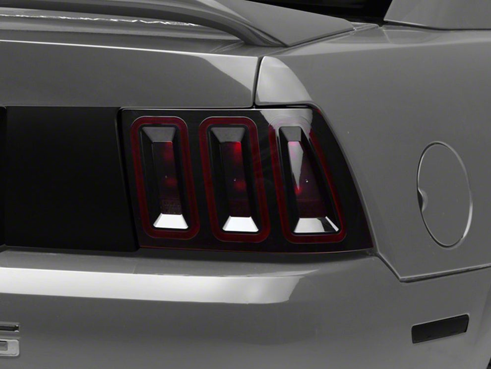 Raxiom Icon LED Tail Lights; Black Housing; Smoked Lens (99-04 Mustang